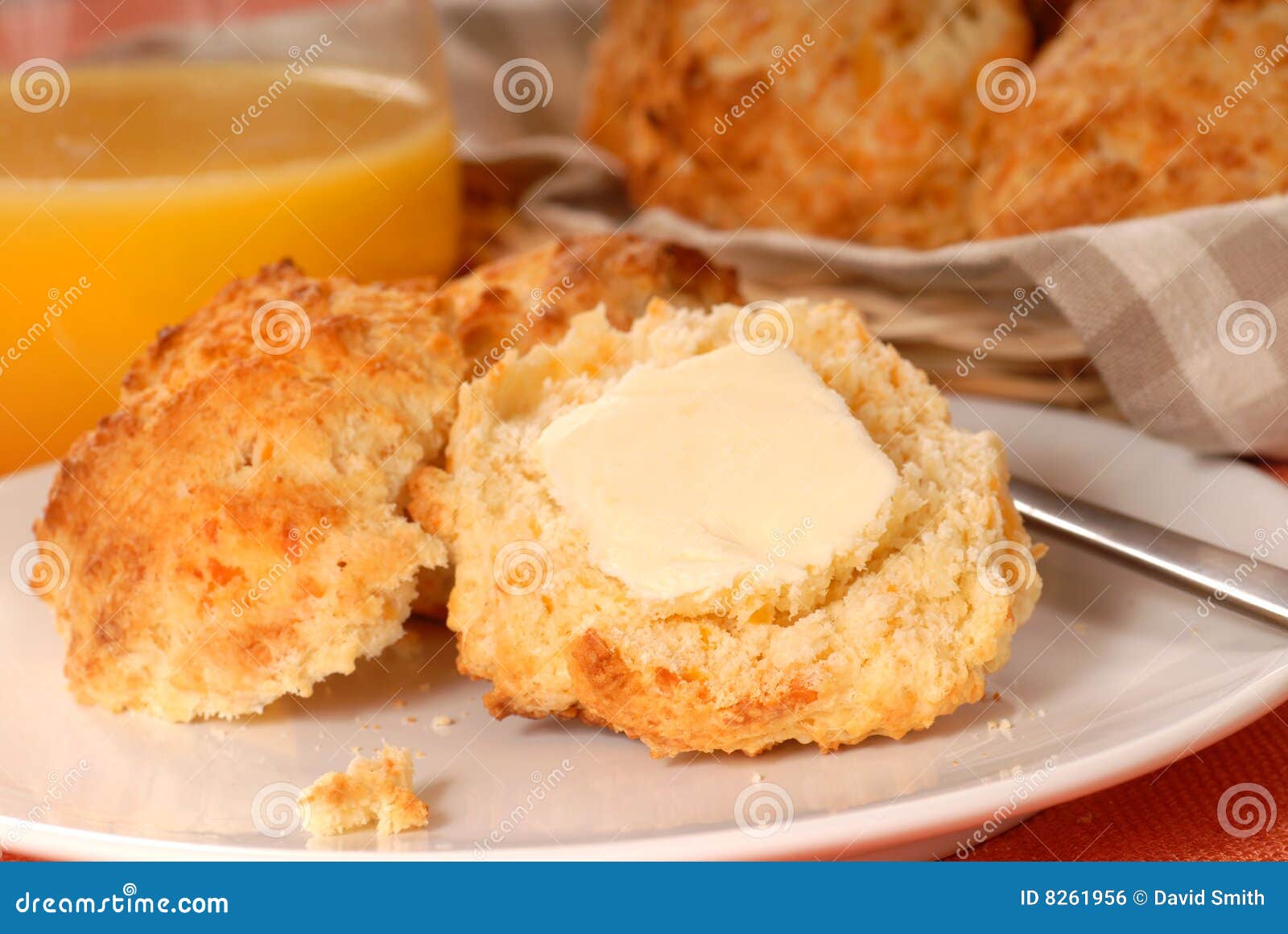 Cheddar Cheese Biscuits with Butter Stock Photo - Image of cheddar ...