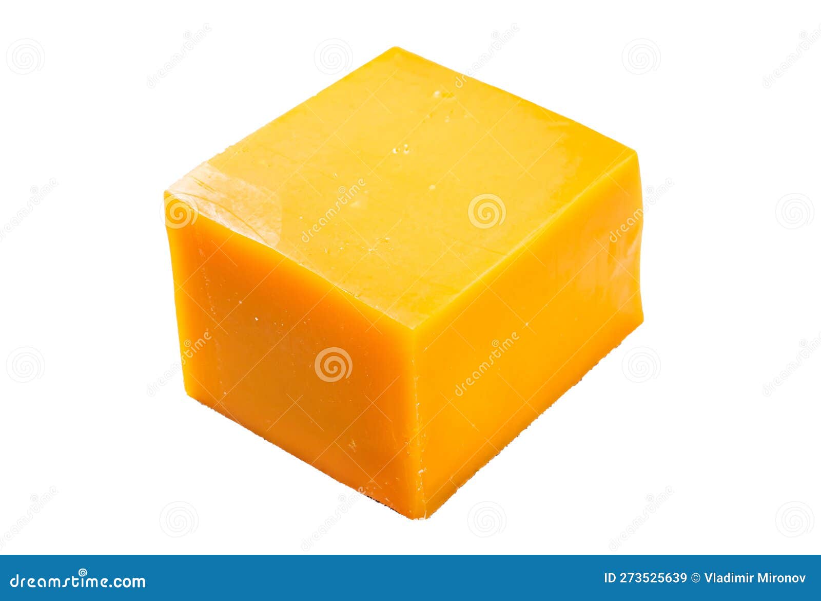 Cheddar Cheese Block on a Kitchen Table. Isolated on White Background ...