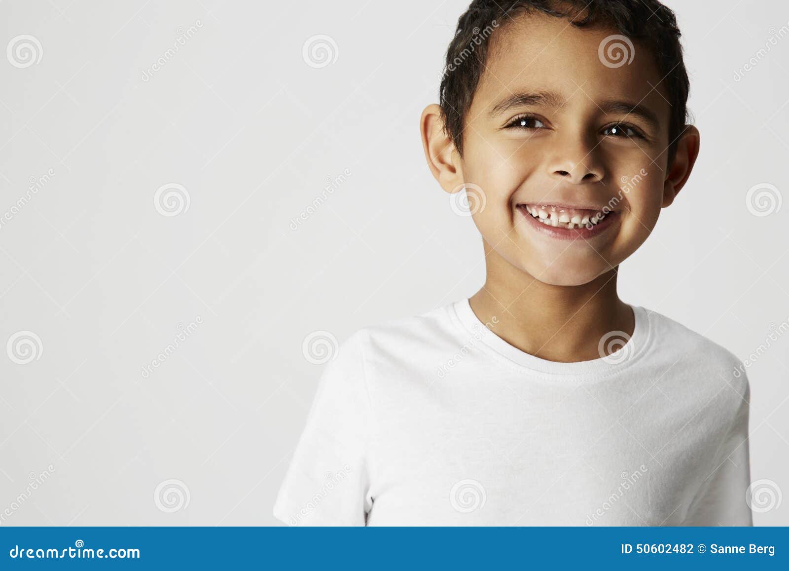 Cheeky boy, smiling stock photo. Image of brown, color - 50602482