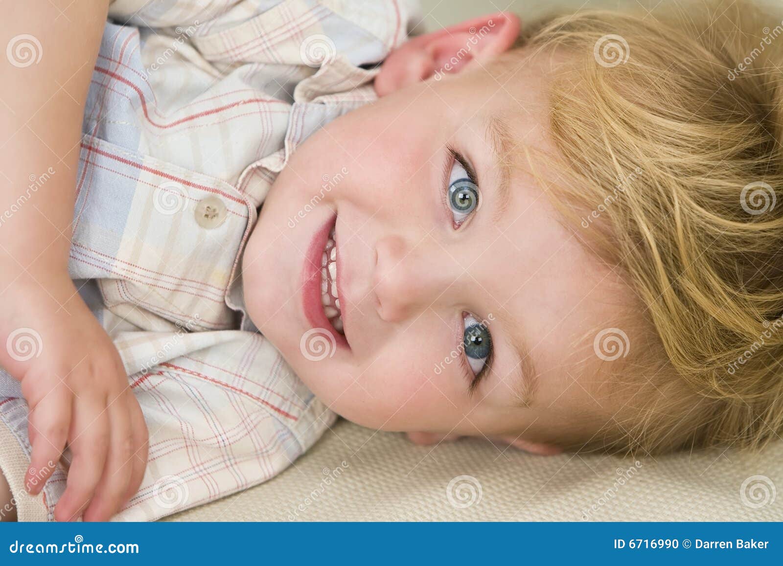 Cheeky Grin stock photo. Image of child, sweet, grin, blue - 6716990