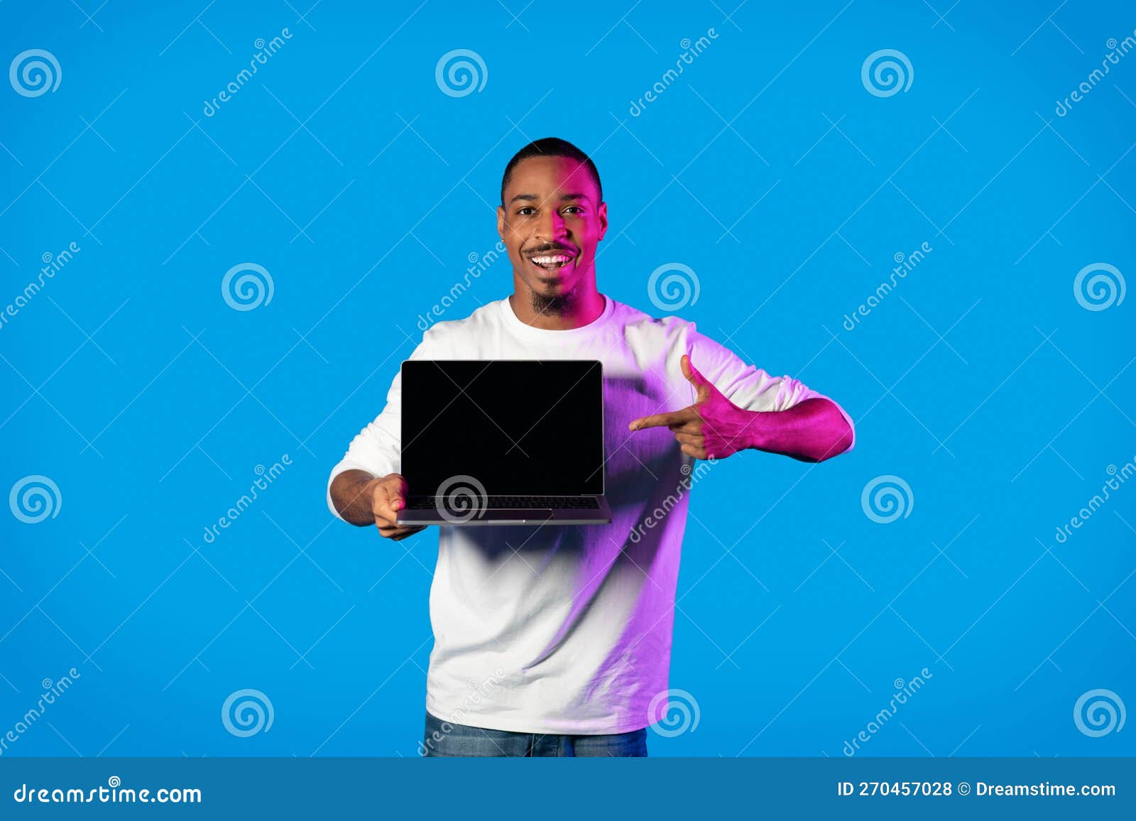 Cheerful African American Guy Pointing at Computer Blank Screen Stock ...