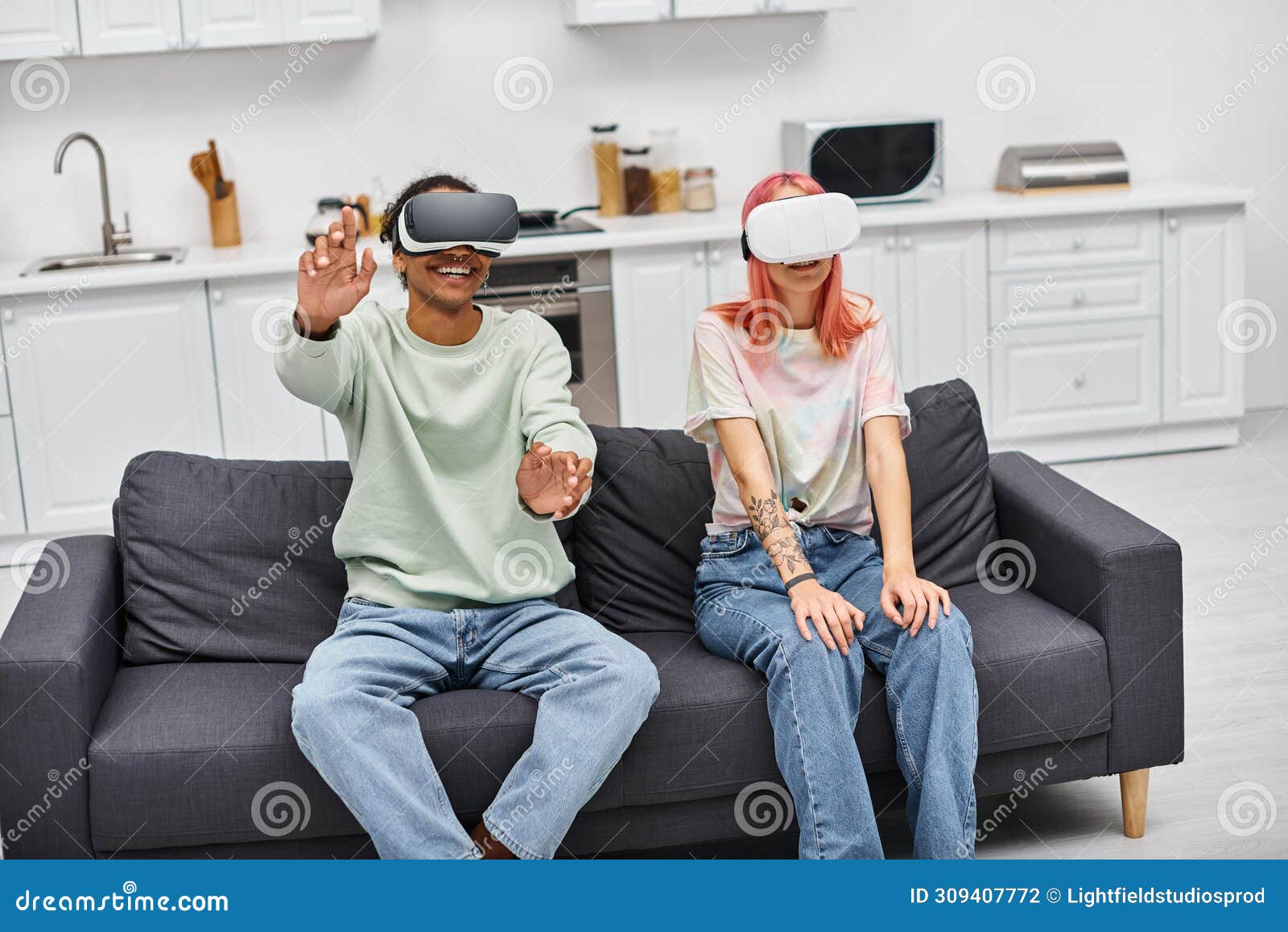Cheerful Appealing Multicultural Couple Sitting on Stock Photo - Image ... Cheerful Appealing Multicultural Couple Sitting on Stock Photo - Image ...