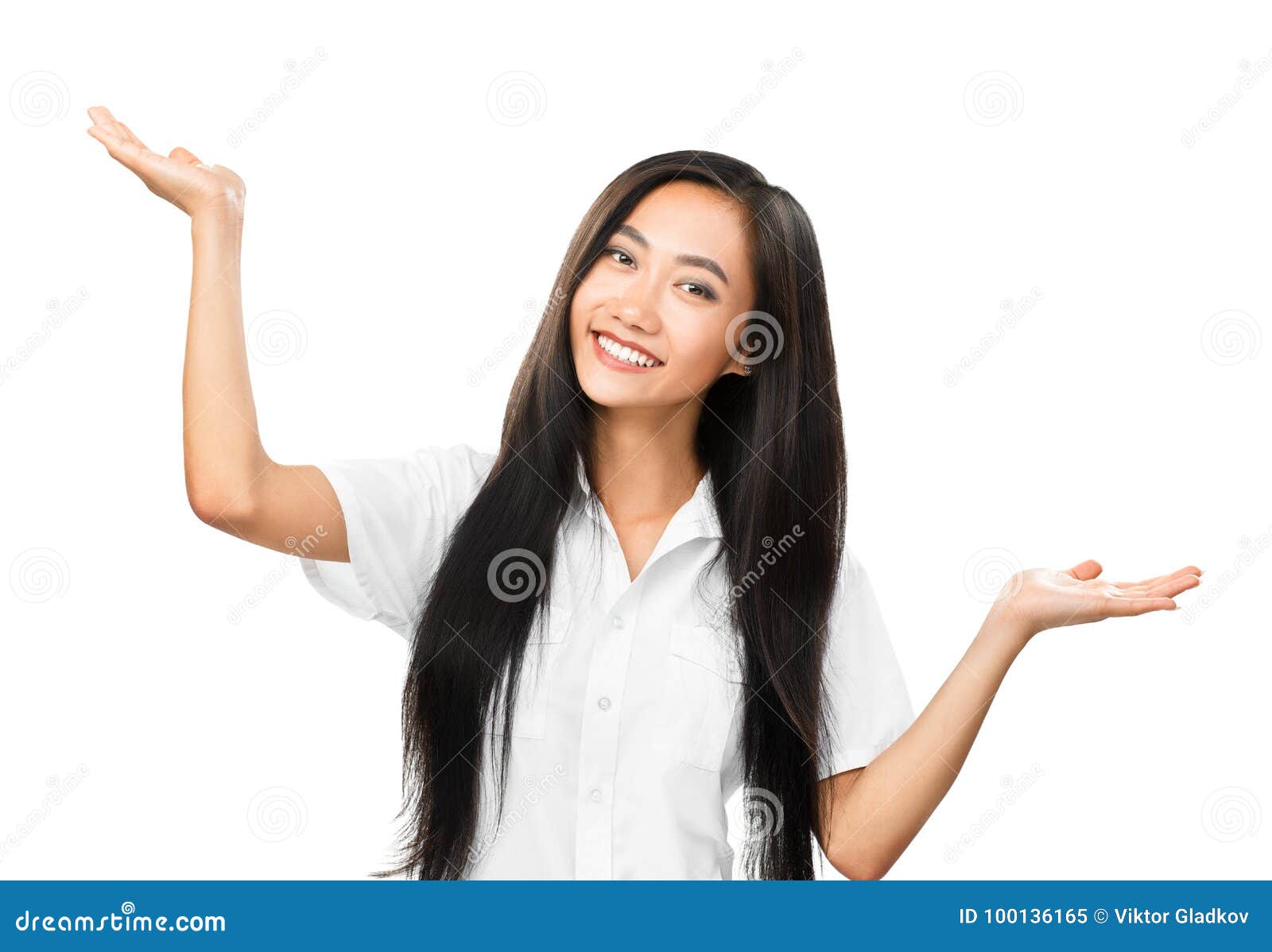 Cheerful Asian Woman Gesturing With Hands And Looking At Camera Stock