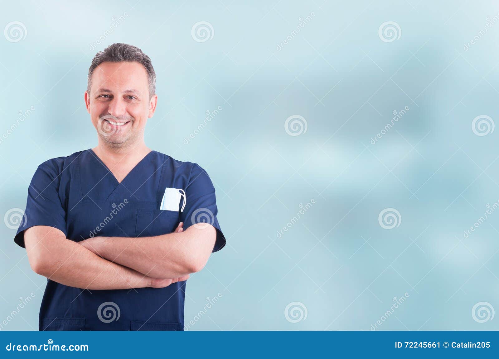 Cheerful Attractive Medic Standing with Folded Arms and Posing Stock ...