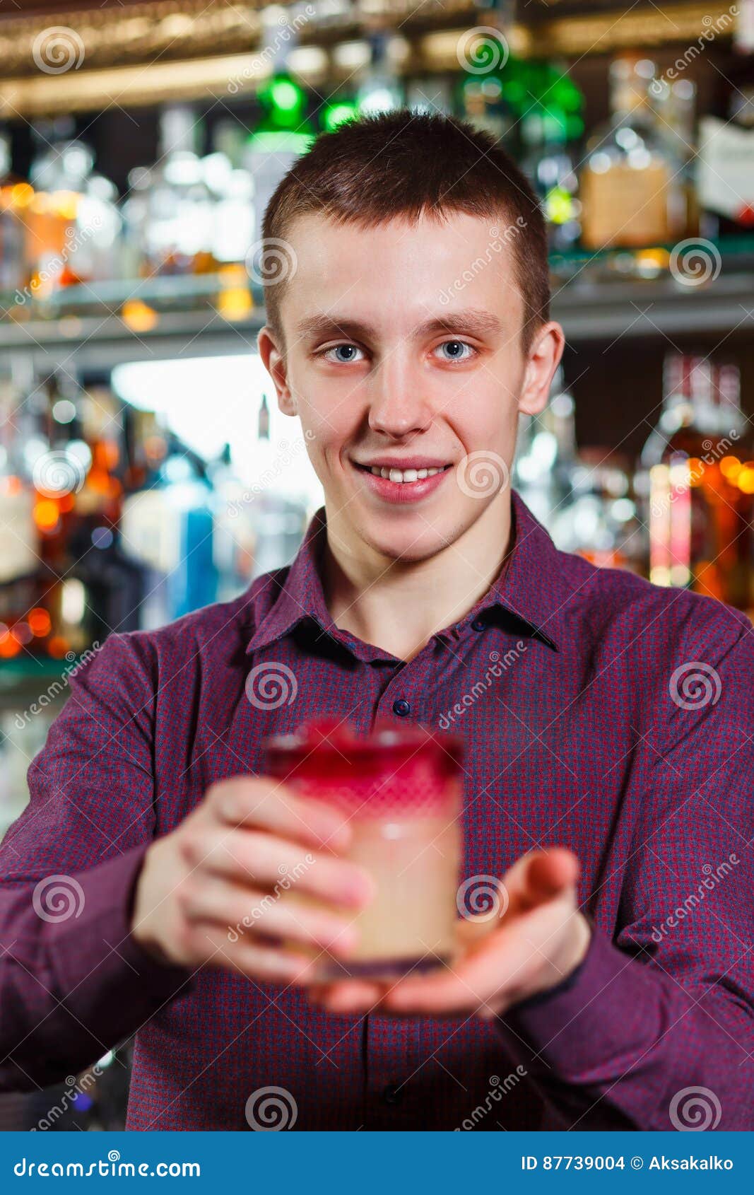 Cheerful Bartender Gives the Cocktail To Customer. Stock Photo - Image ...