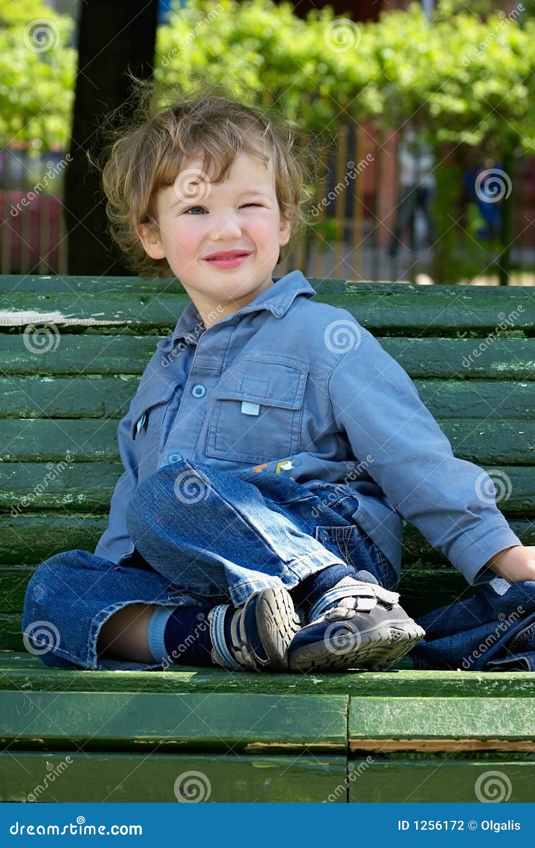 Cheerful blinking child stock photo. Image of childhood - 1256172