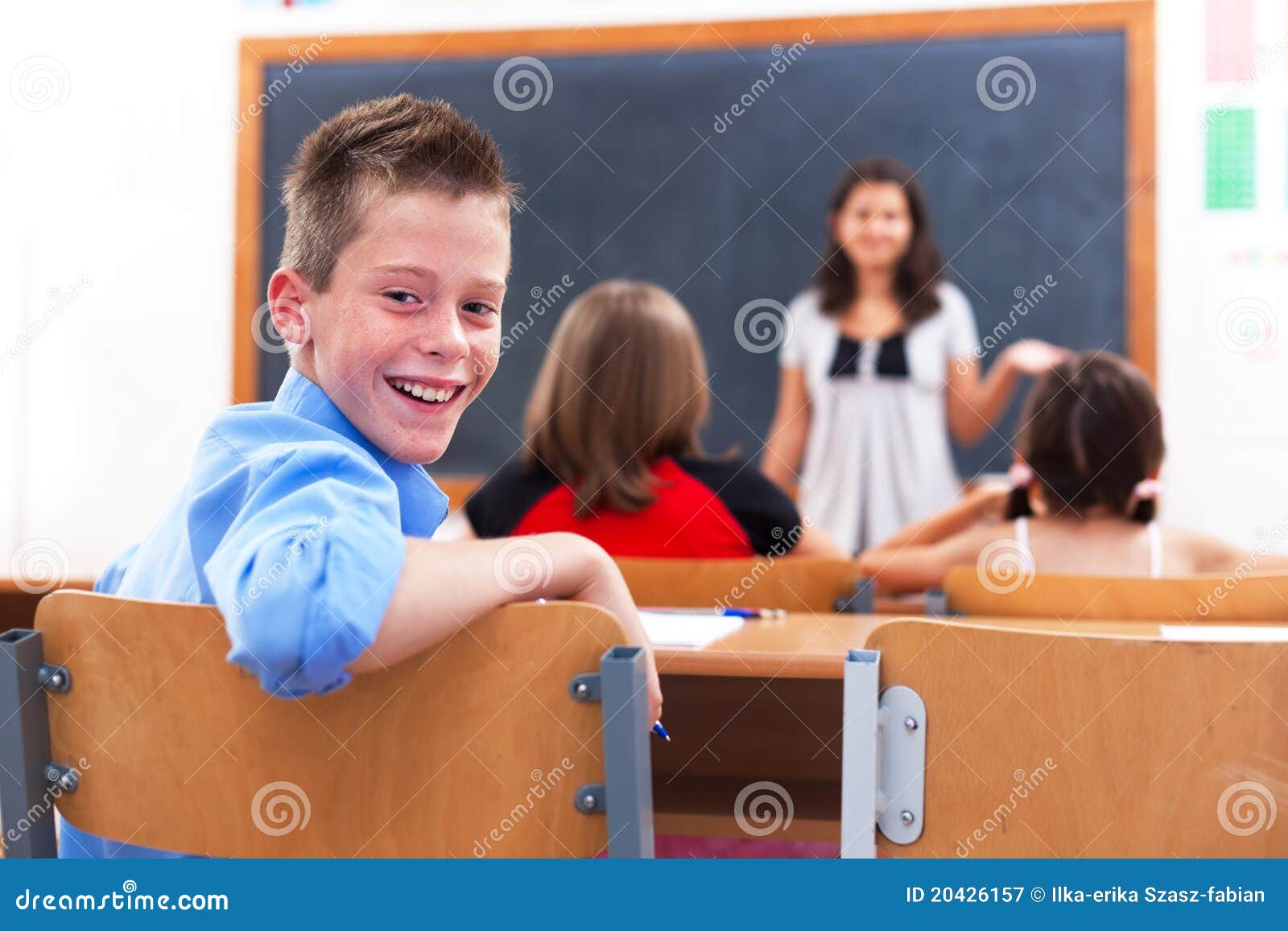 Cheerful boy in class room stock image. Image of turn - 20426157 Cheerful boy in class room stock image. Image of turn - 20426157