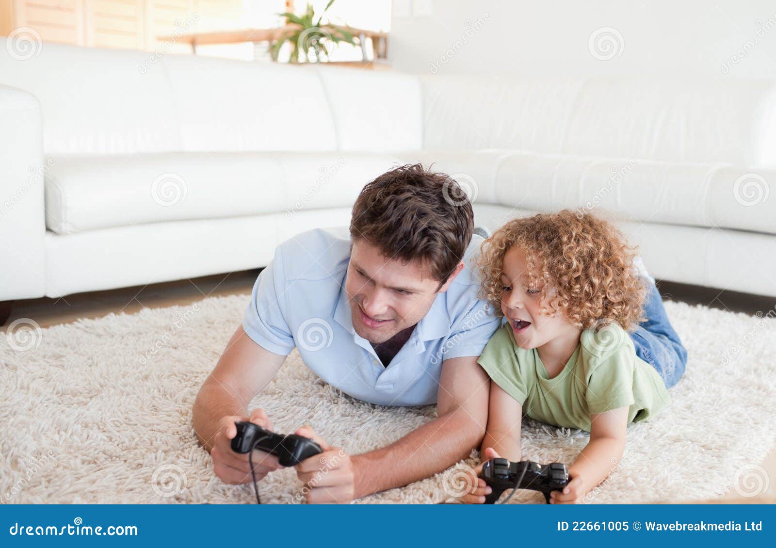 Cheerful Boy and His Father Playing Video Games Stock Image - Image of ...