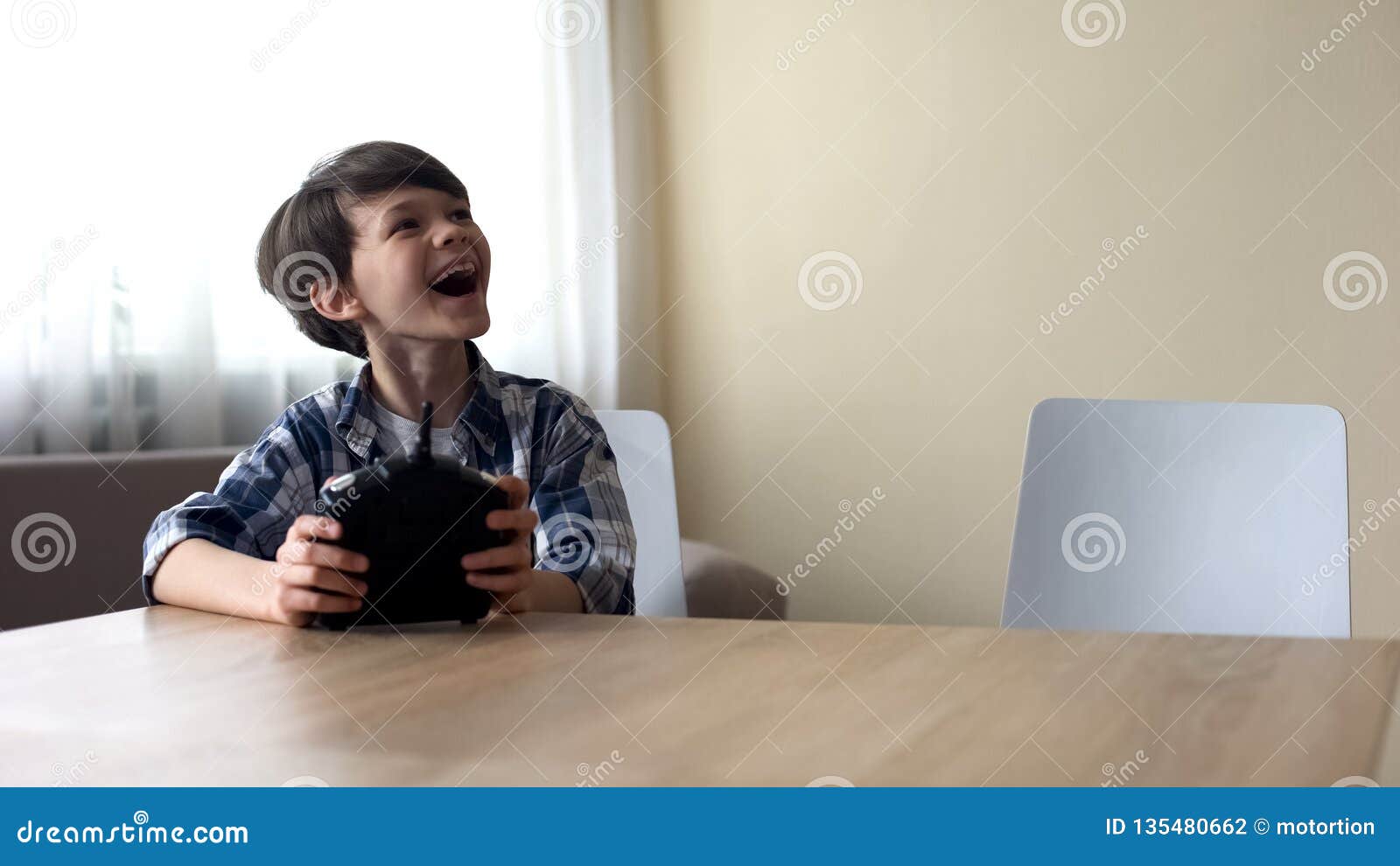 Cheerful Boy Operating Drone with Remote Control, Rejoicing Cool B-day ...
