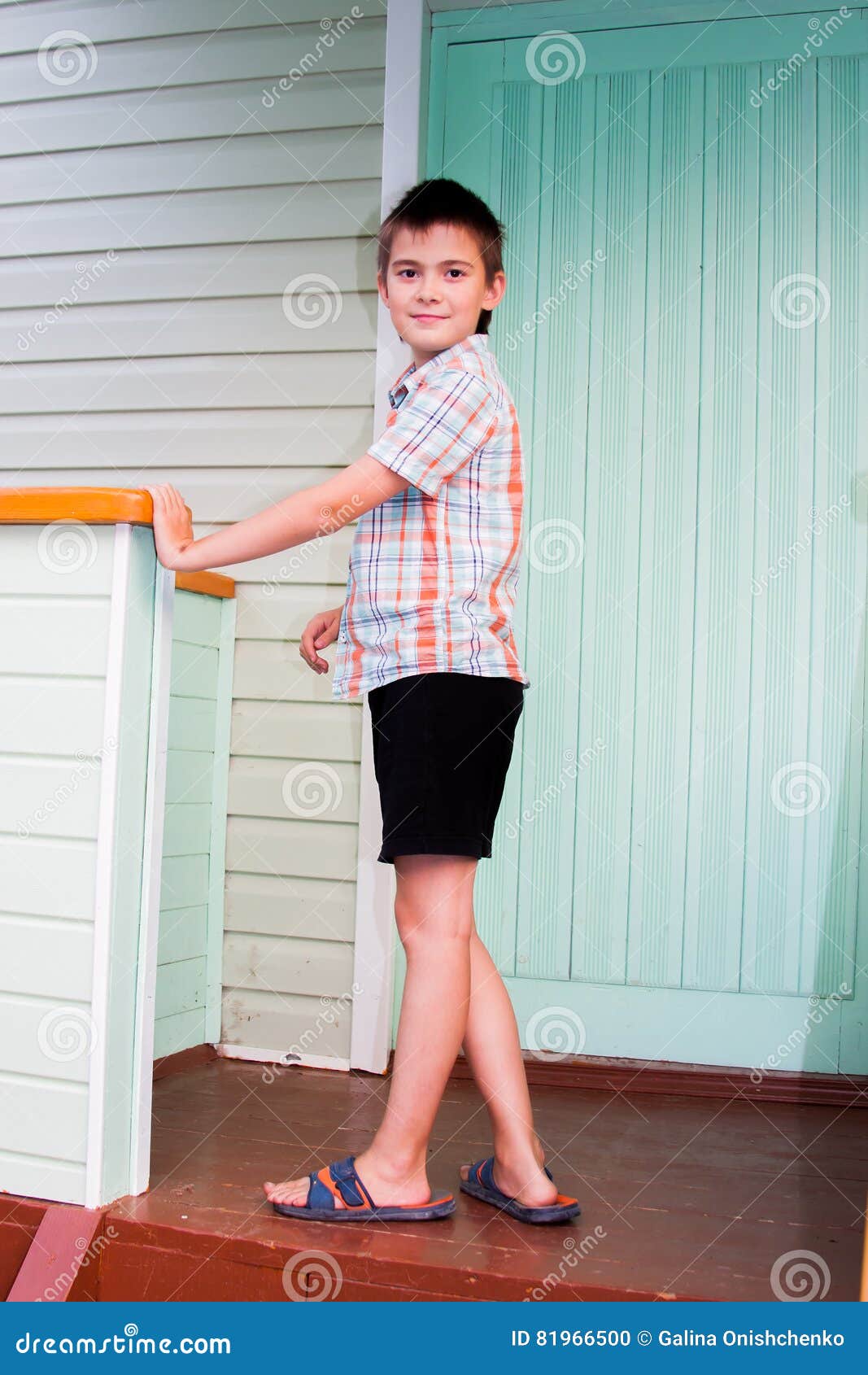 Cheerful Boy Standing on the Porch Stock Photo - Image of green, porch ...