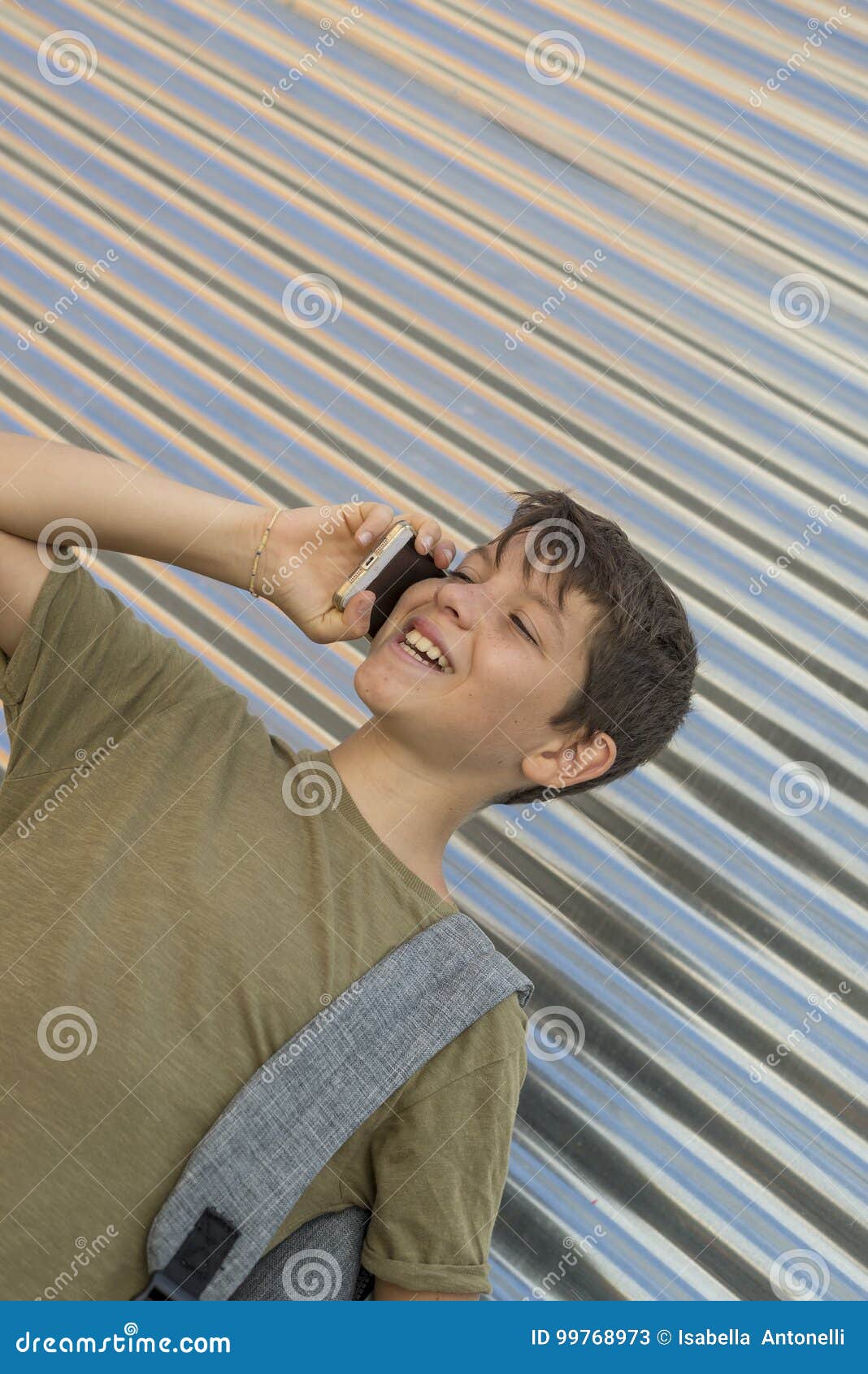 Cheerful Boy Using a Mobile Phone Stock Image - Image of primary ...
