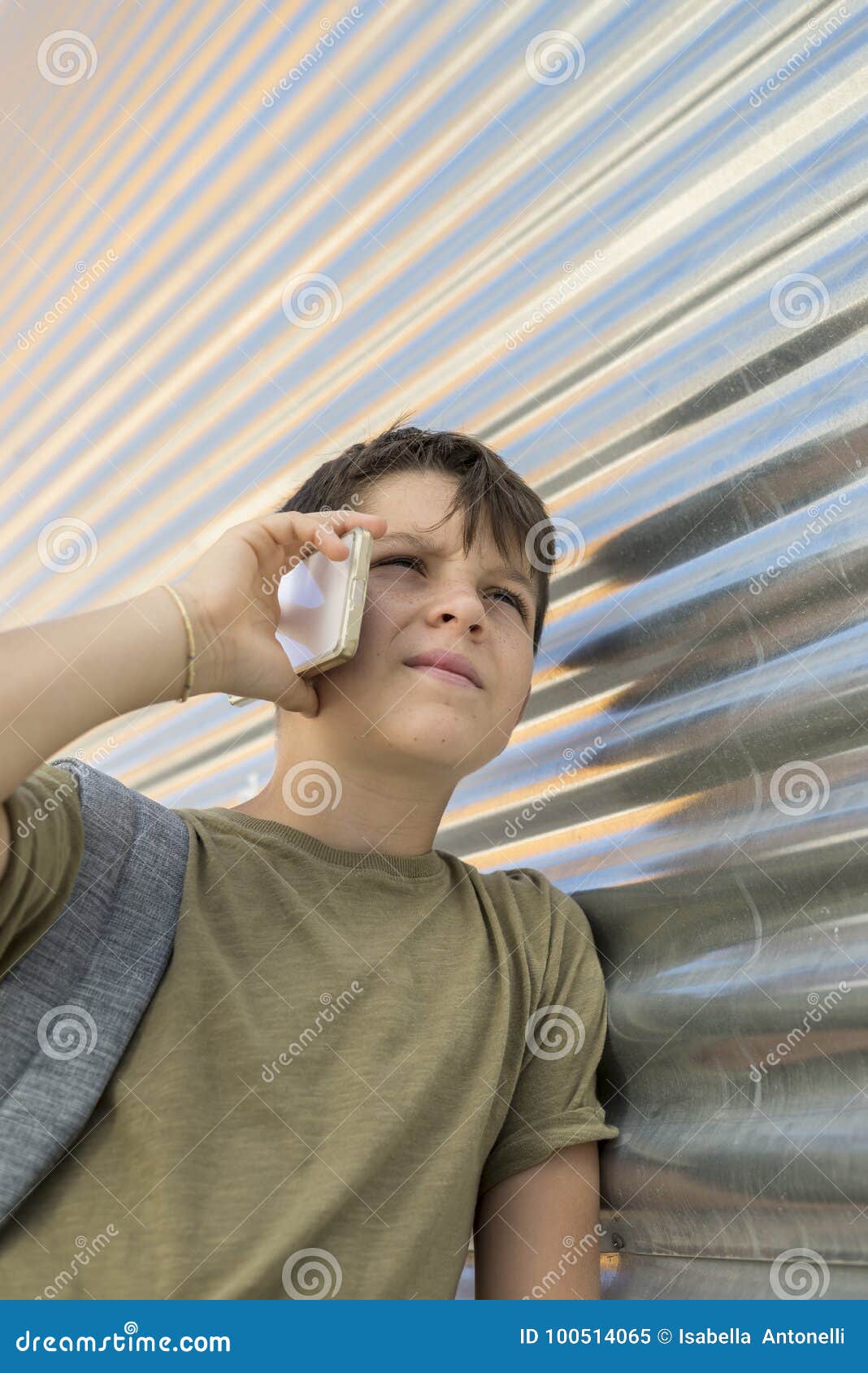 Cheerful Boy Using a Mobile Phone Stock Image - Image of leisure, city ...