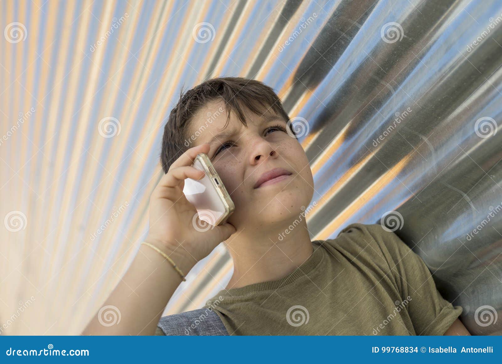Cheerful Boy Using a Mobile Phone Stock Photo - Image of caucasian ...