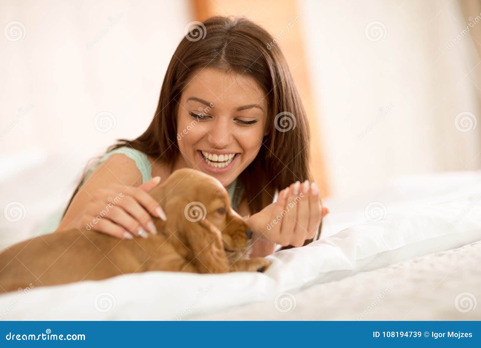 Cheerful Brunette Caressing Her Puppy Stock Image - Image of attractive ...