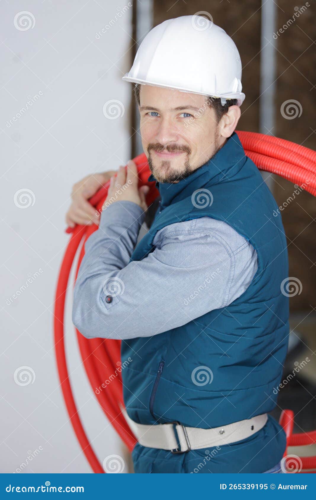 Cheerful Builder Carrying Red Pipe Stock Image - Image of water ...