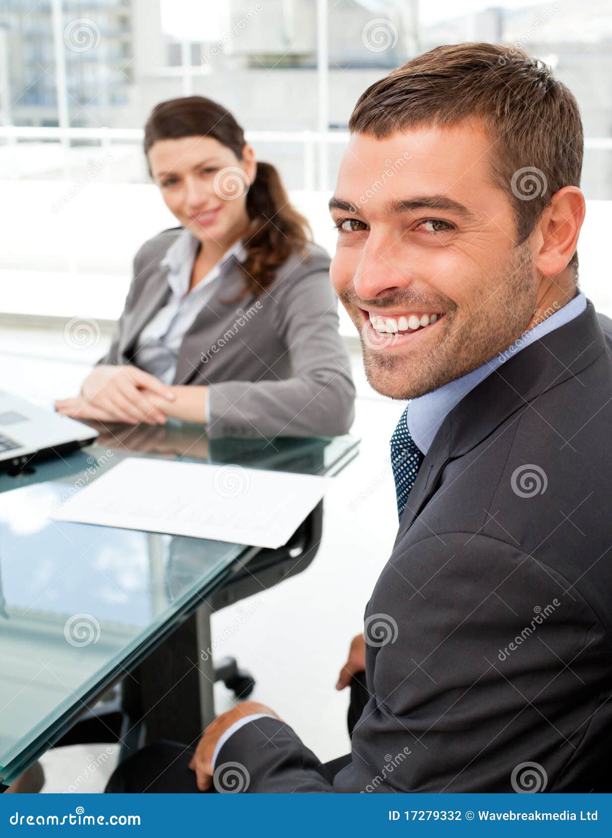 Cheerful Business People Sitting at a Table Stock Photo - Image of ...