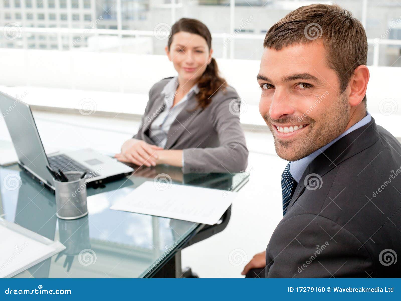 Cheerful Business People Working on a Laptop Stock Photo - Image of ...