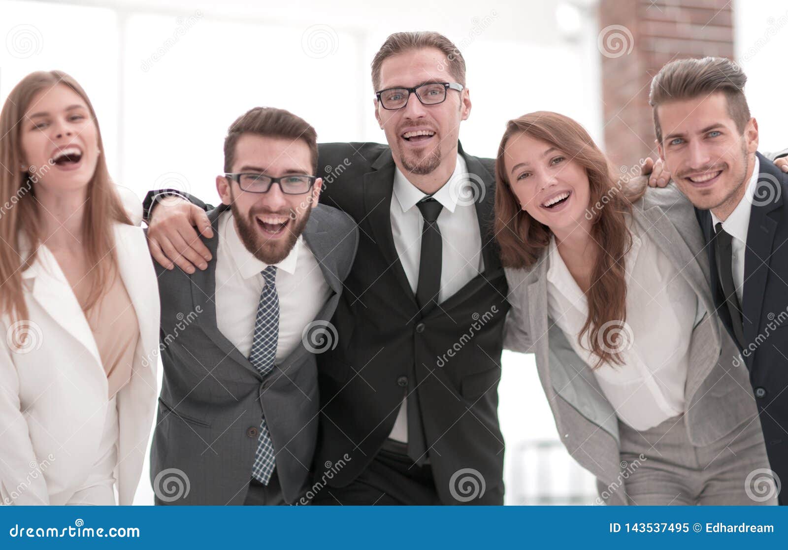 Cheerful Business Team Standing in the Office Stock Image - Image of ...