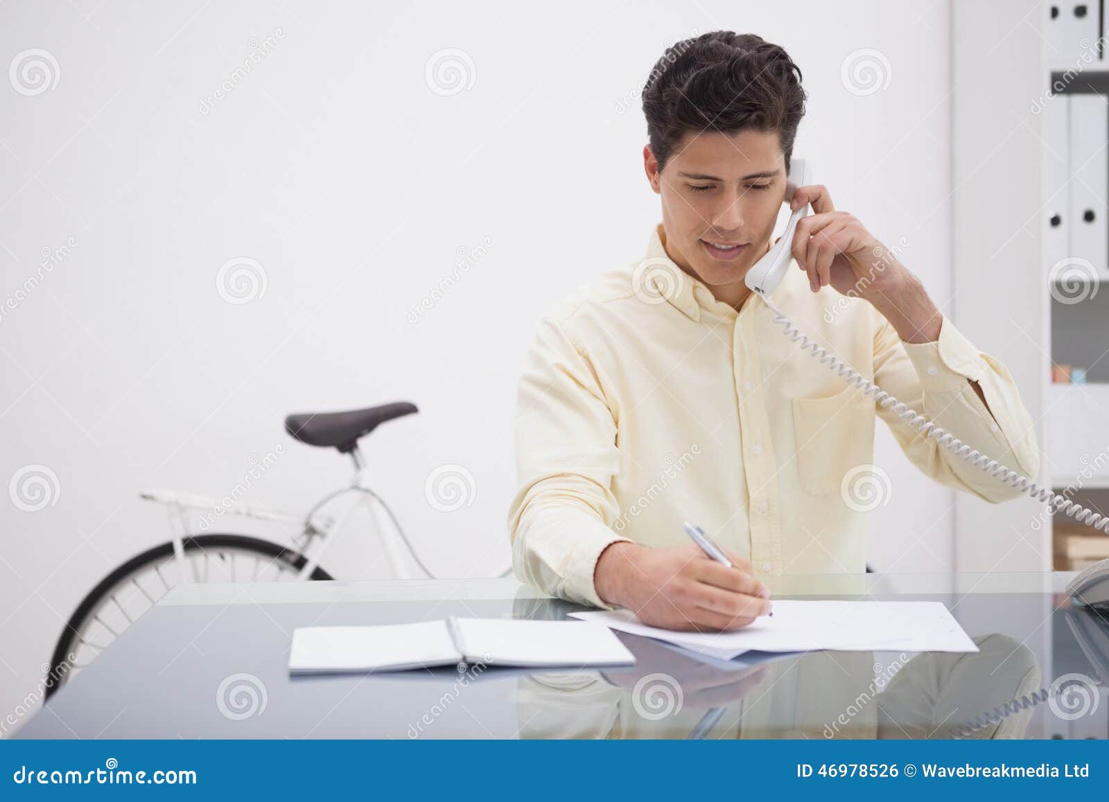 Cheerful Businessman on the Phone Taking Note Stock Photo - Image of ...