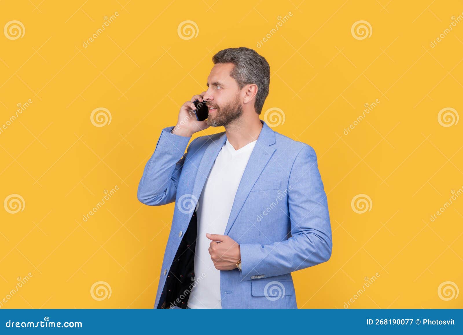 Cheerful Businessman Speak on Phone in Studio. Businessman Speak on ...