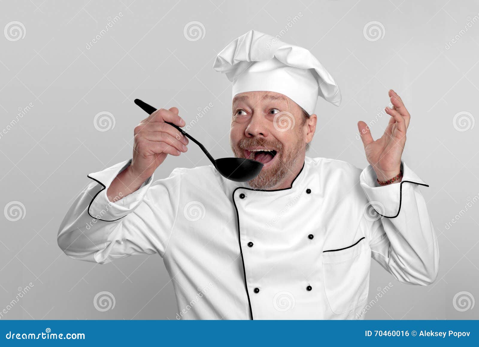 Cheerful chef with a beard stock photo. Image of adult - 70460016