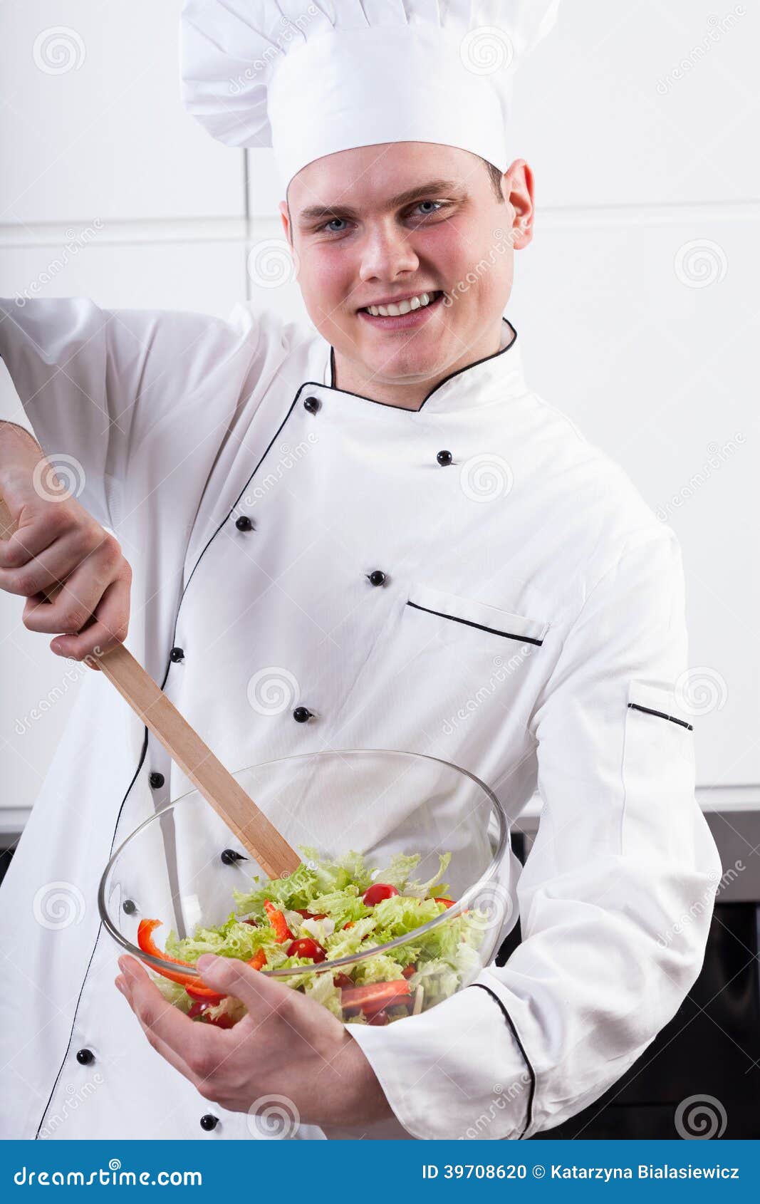 Cheerful chef mixing salad stock photo. Image of mixing - 39708620