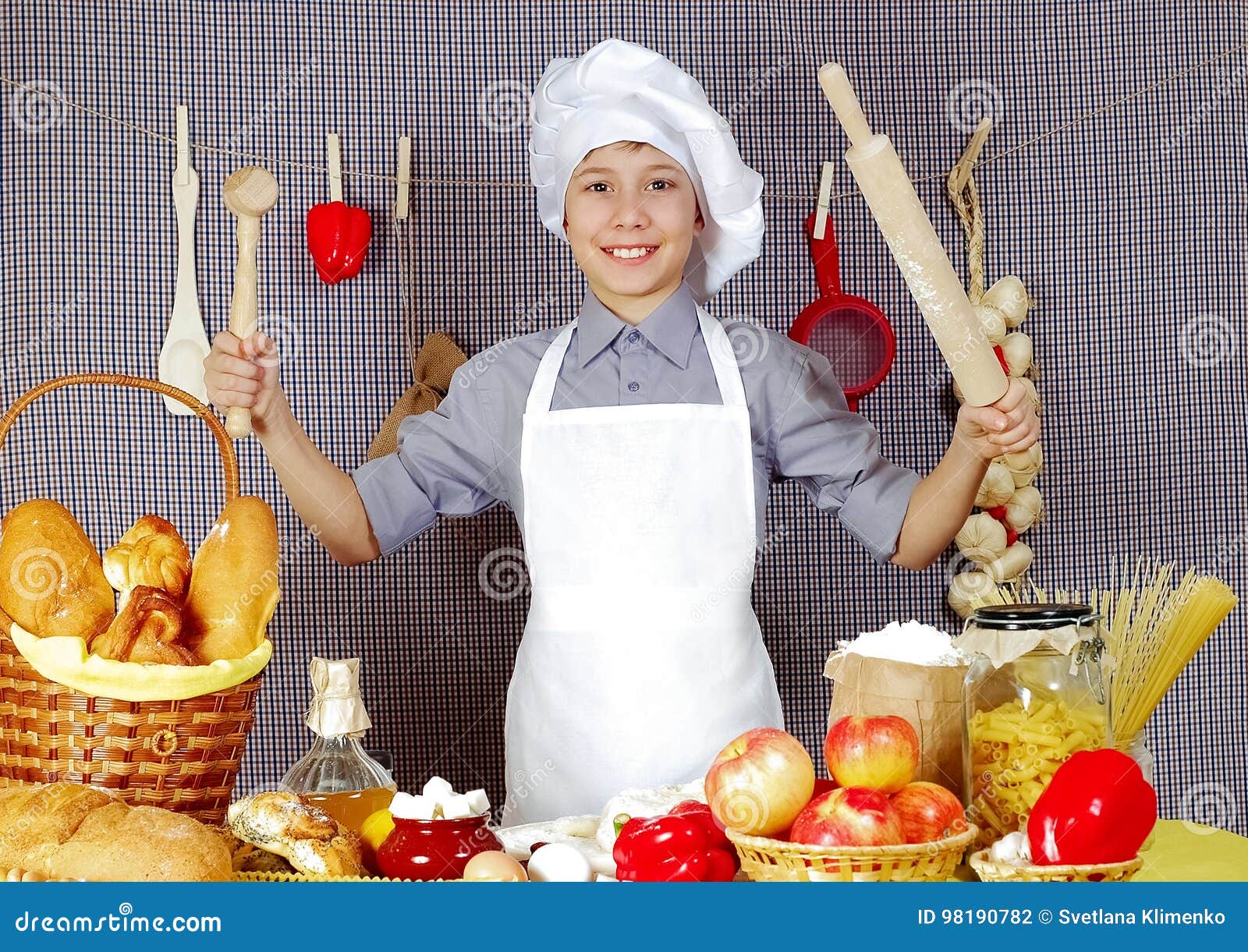 Cheerful Chef at the Table with Different Products Stock Photo - Image ...