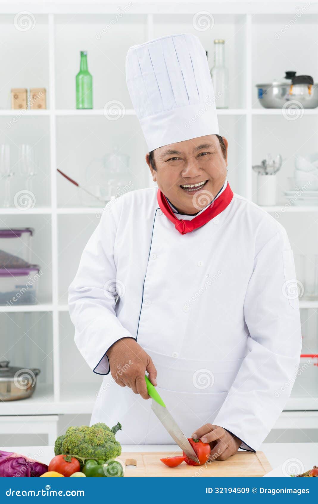 Cheerful chief cook stock image. Image of holding, kitchen - 32194509