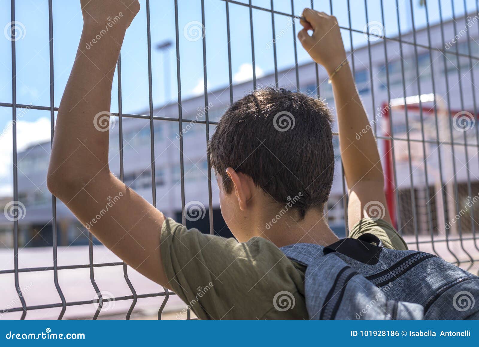 Cheerful Child Carrying His Backpack Standing in Front of the Sc Stock ...