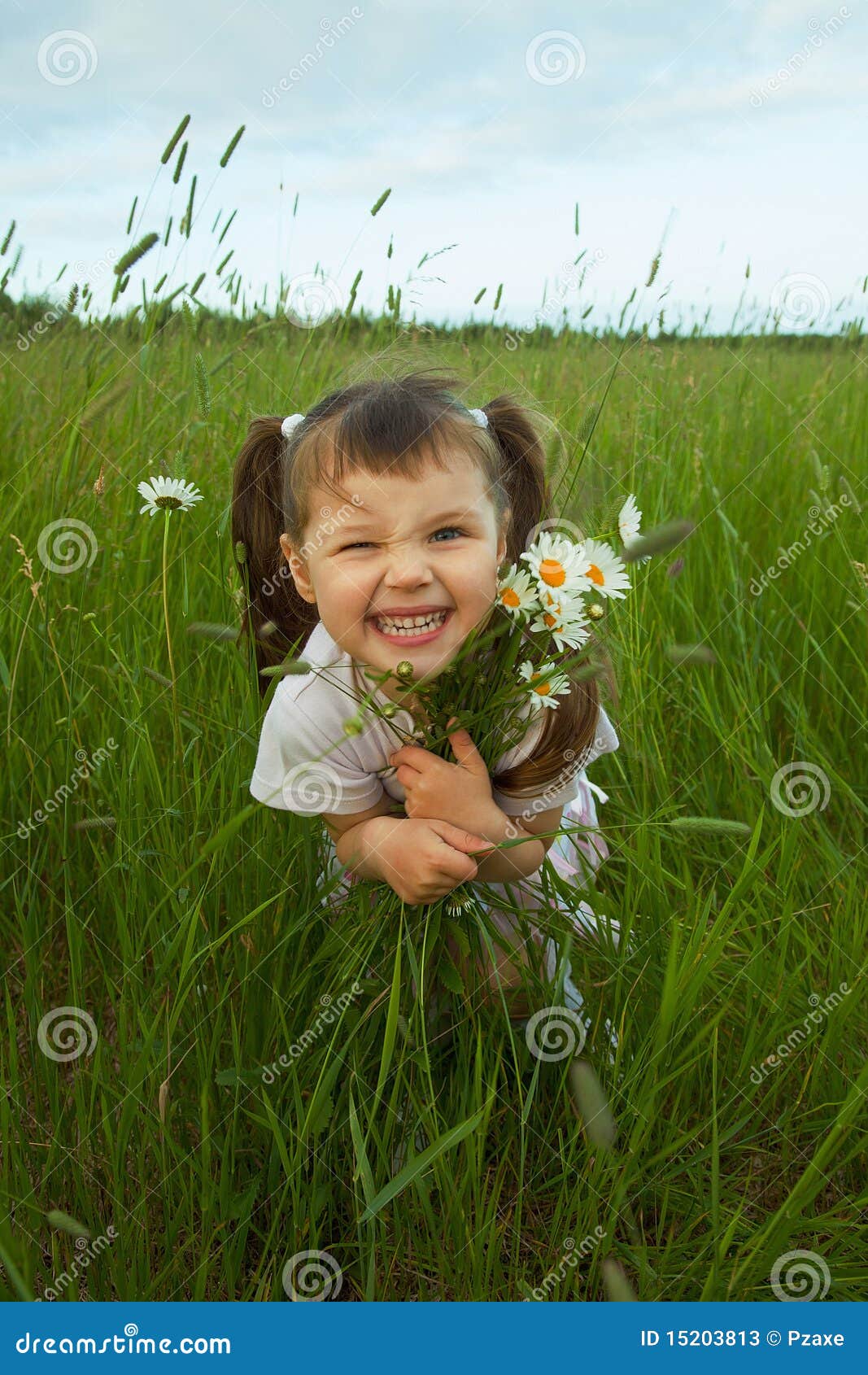 Cheerful Child Embraces Wild Flowers Stock Image - Image of beautiful ...