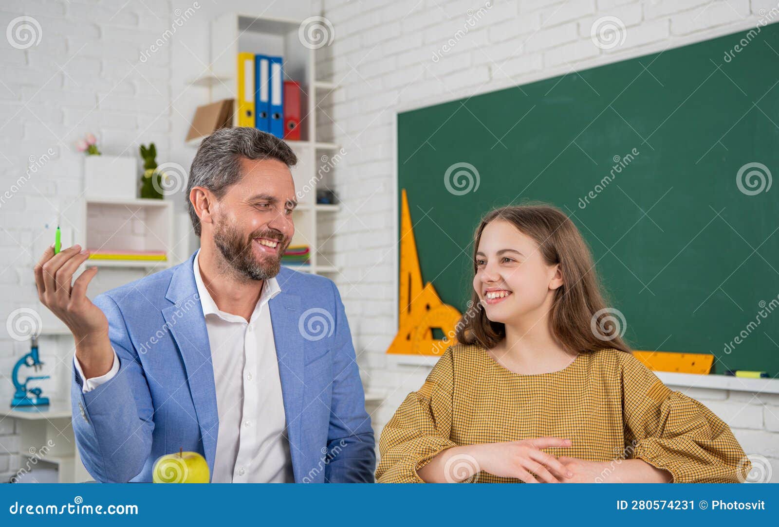 Cheerful Child Study in Classroom with Tutor Stock Image - Image of ...