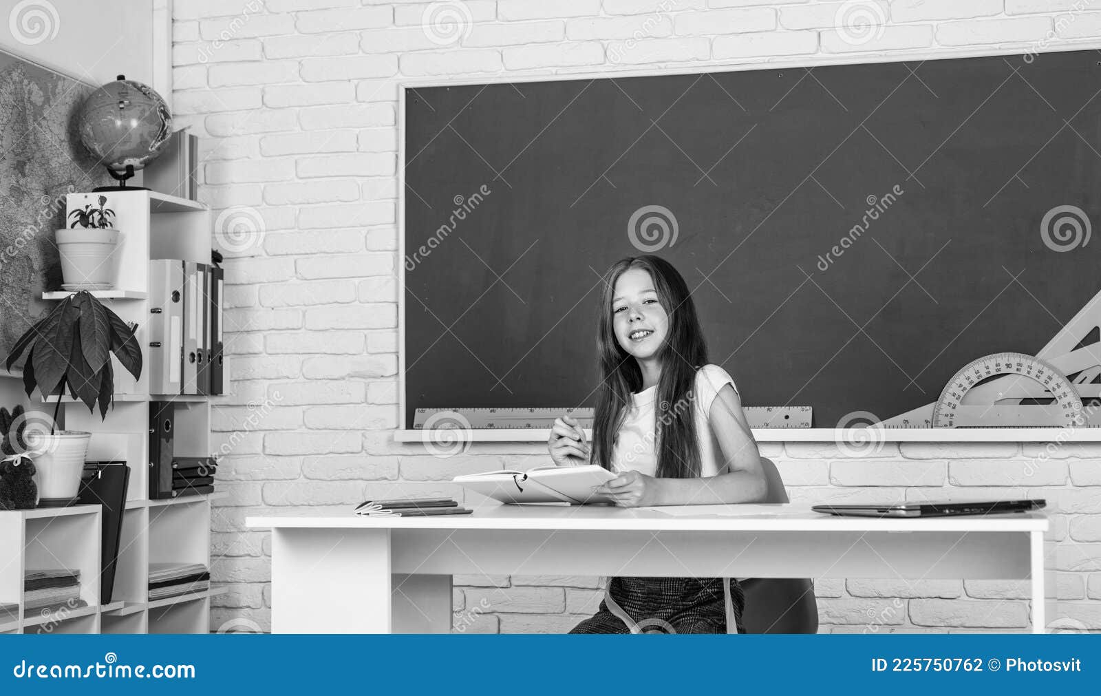 Cheerful Child Work in School Classroom during Modern Education ...