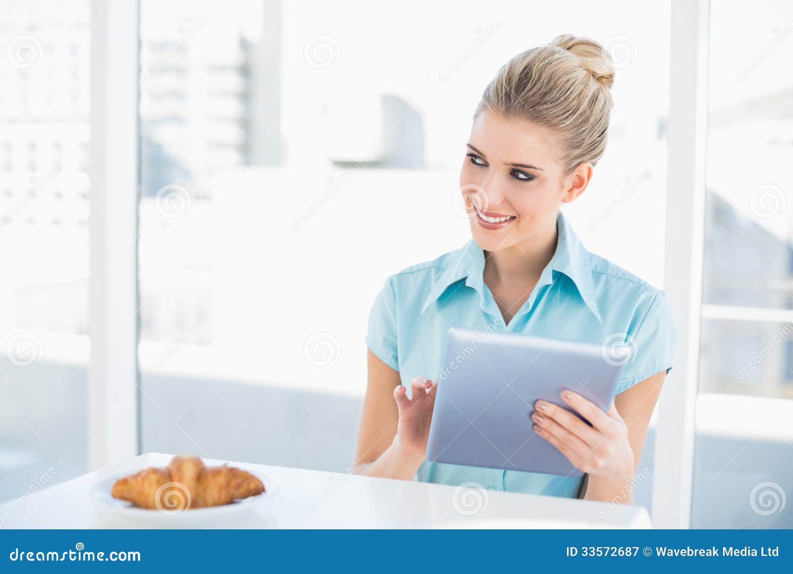 Cheerful Classy Woman Using Tablet while Having Breakfast Stock Image ...