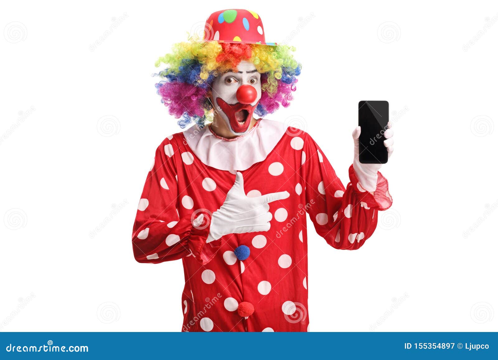 Cheerful Clown Holding a Mobile Phone and Pointing at it Stock Image ...