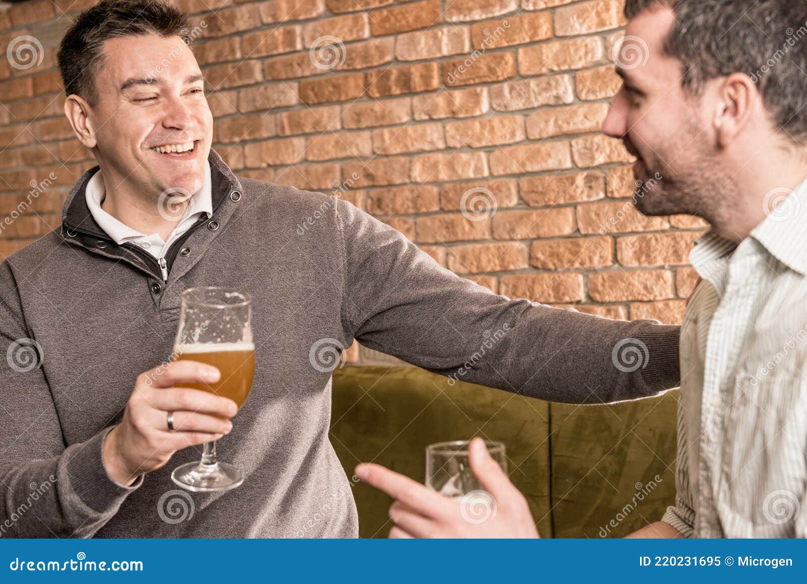 Cheerful Colleagues Drinking Beer after Work Stock Image - Image of ...