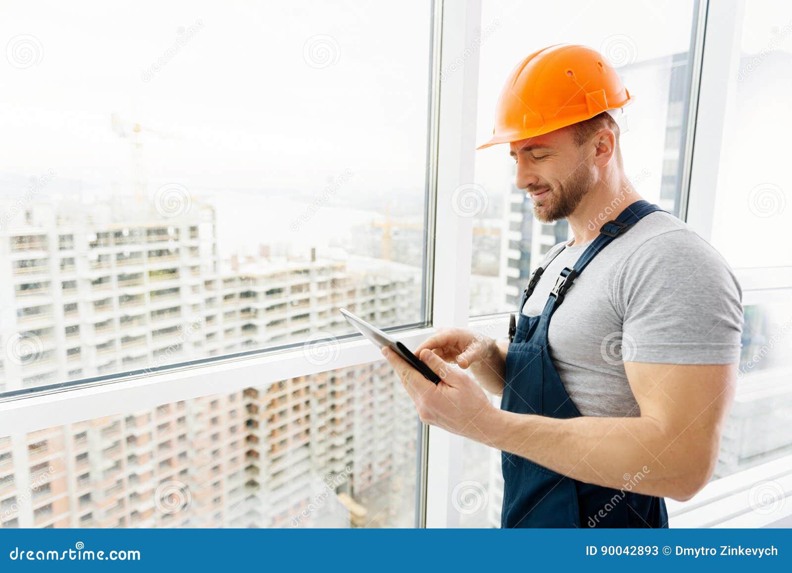 Cheerful Construction Engineer Using Tablet Stock Image - Image of ...