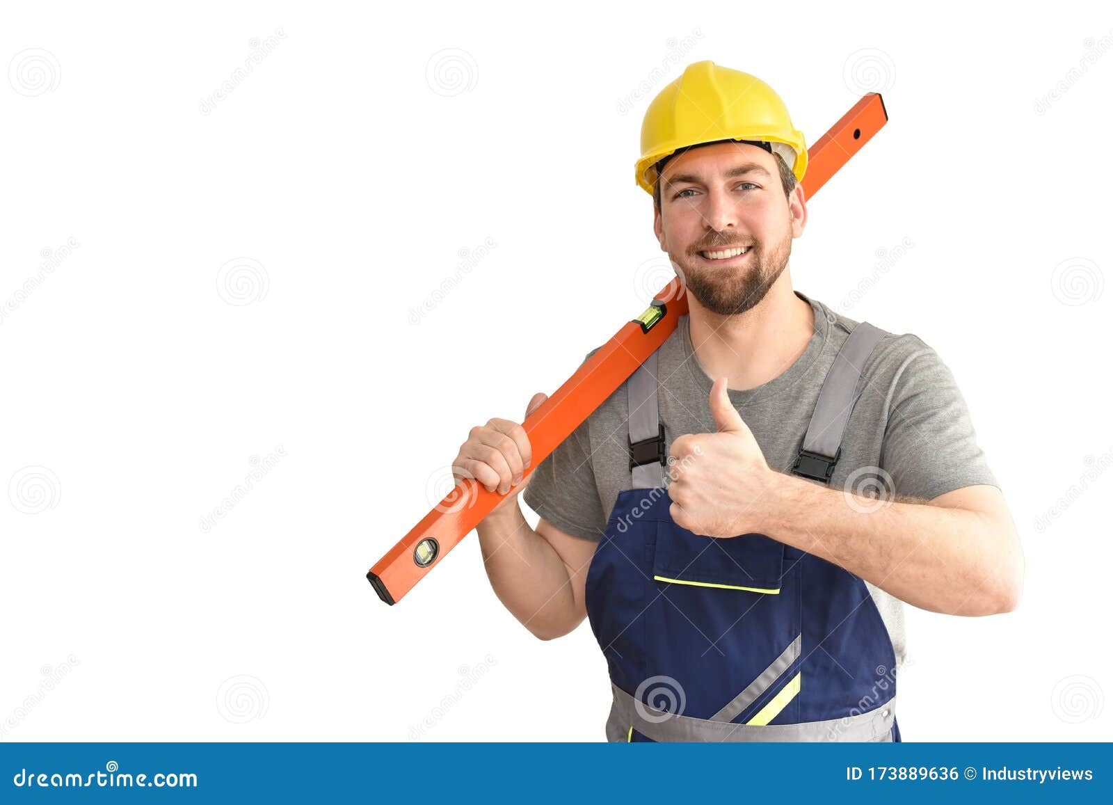 Cheerful Construction Worker - Craftsman in Working Clothes with a ...