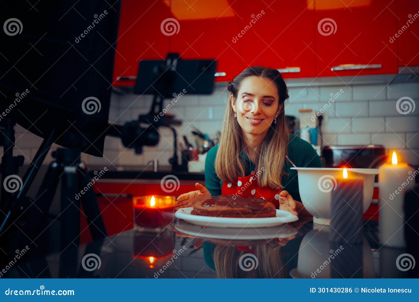 Food Vlogger Presenting and Filming a Chocolate Cake Recipe Stock Photo ...