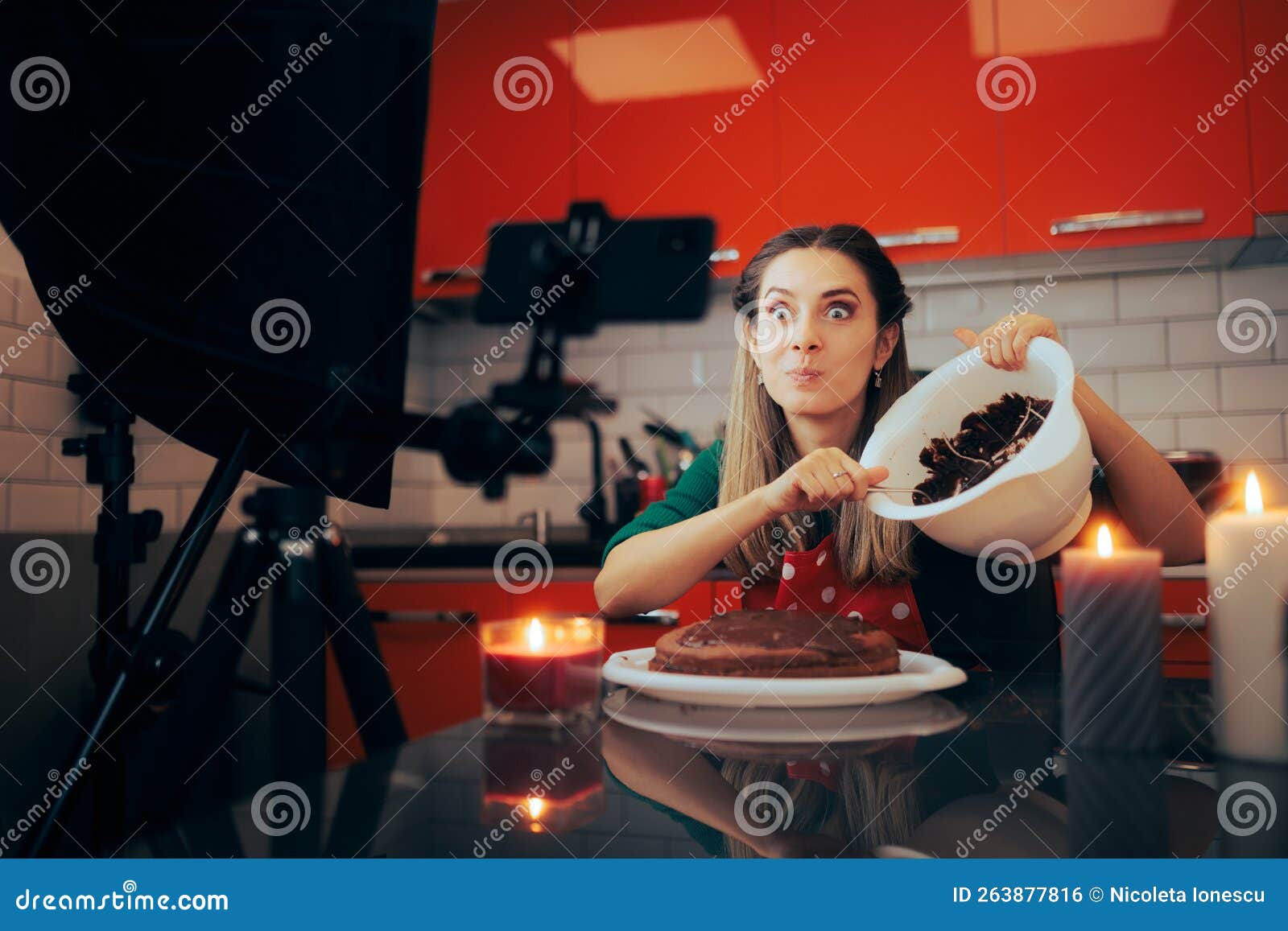 Happy Vlogger Demonstrating a Cake Recipe on Camera Stock Photo - Image ...
