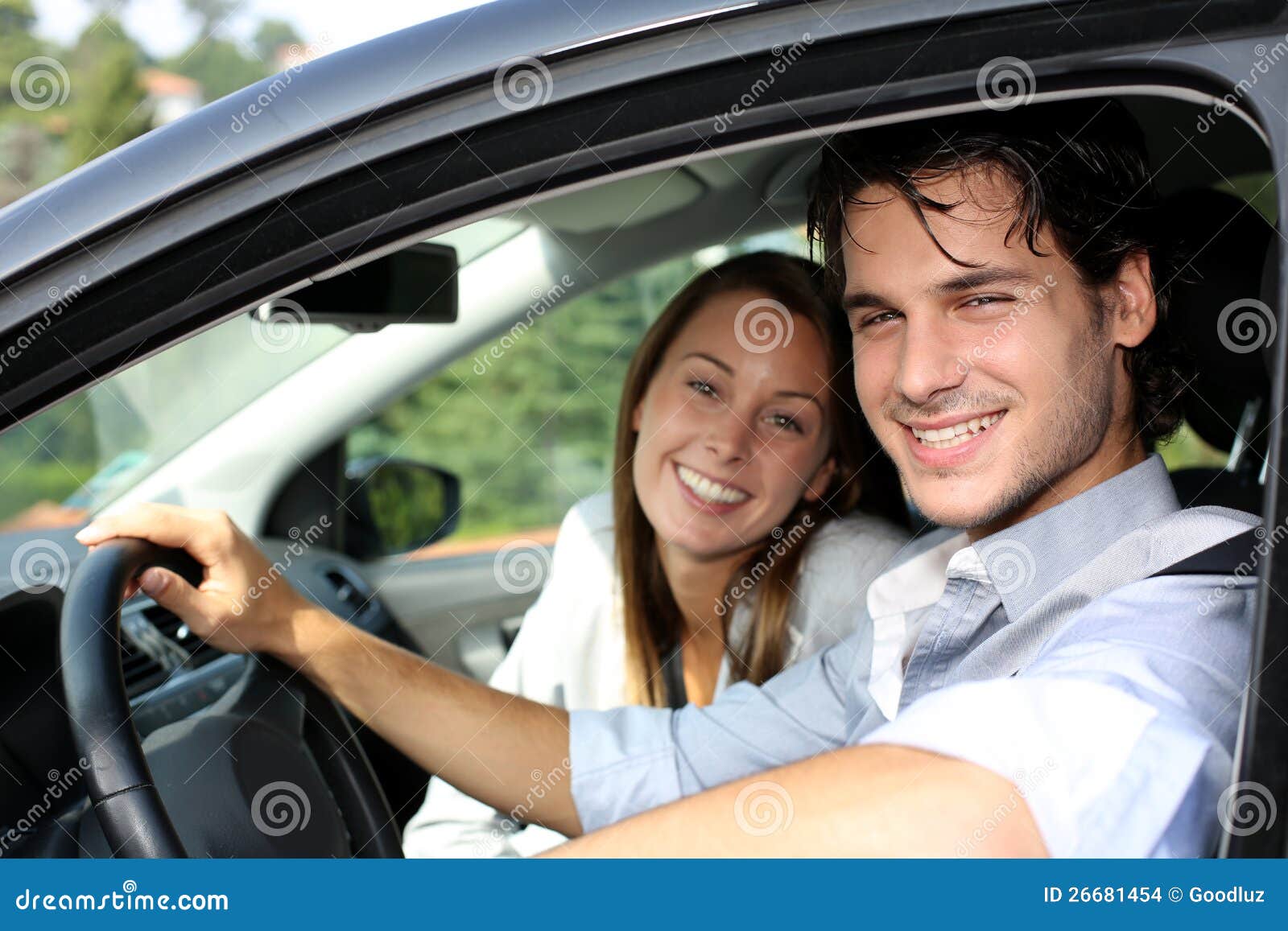 Cheerful Couple Driving Car Stock Photo - Image of auto, owners: 26681454