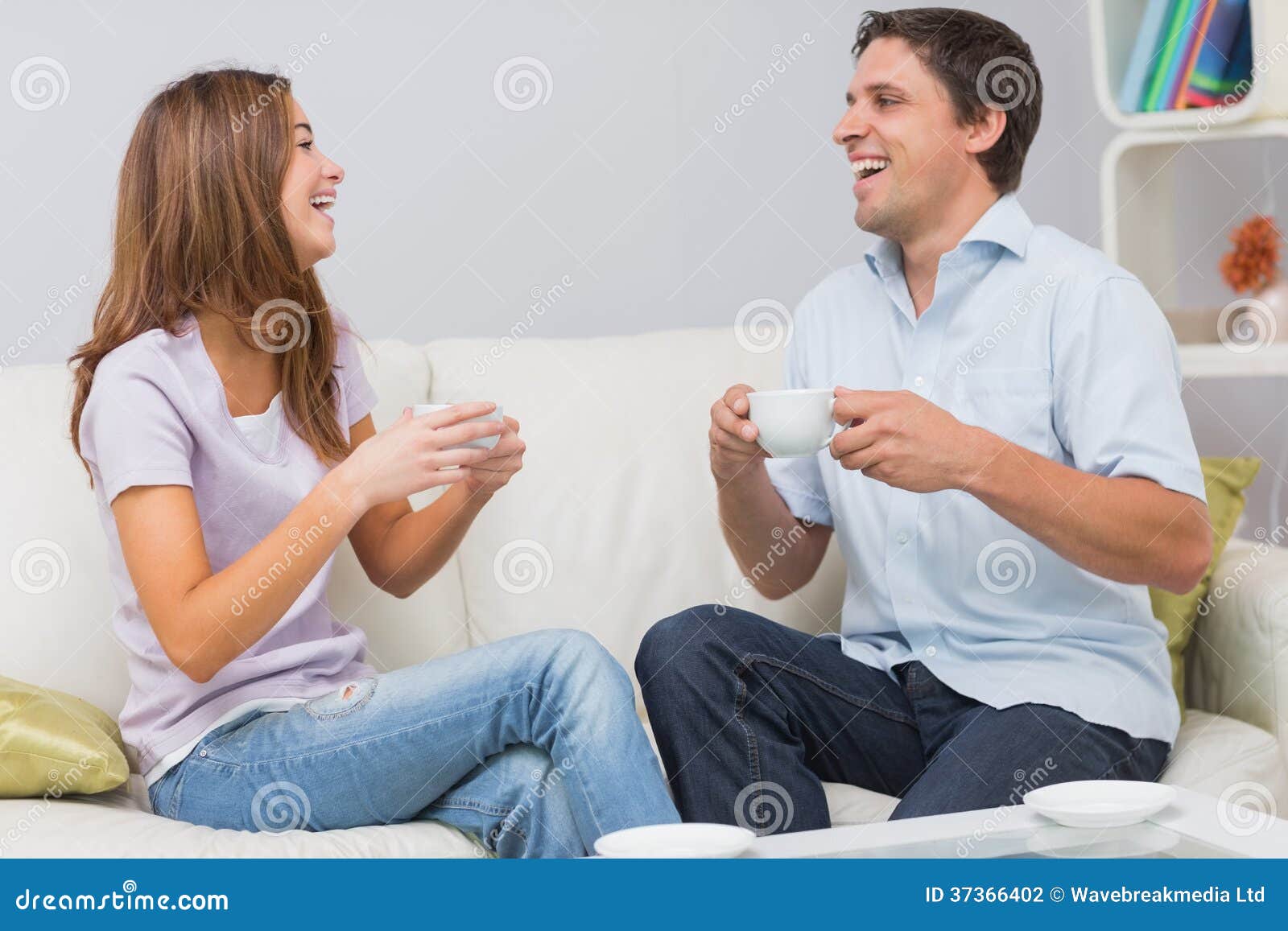 Cheerful Couple Enjoying Their Tea at Home Stock Photo - Image of front ...