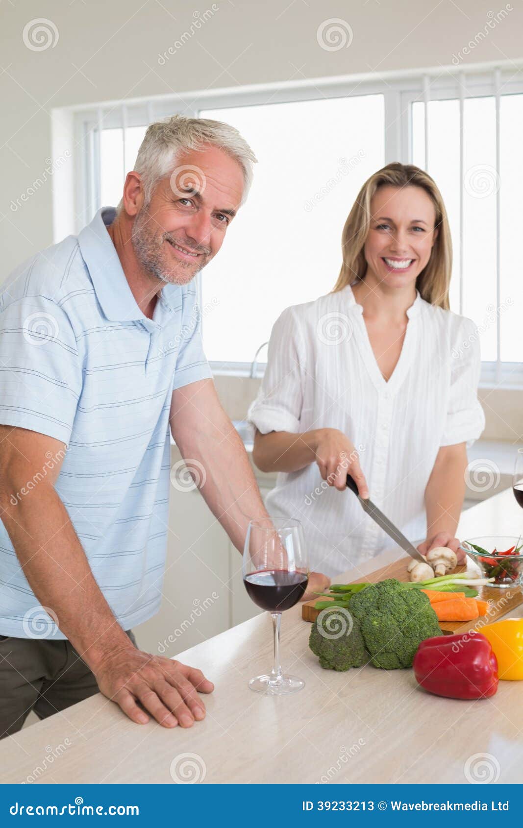 Cheerful Couple Making Dinner Together Stock Image - Image of woman ...