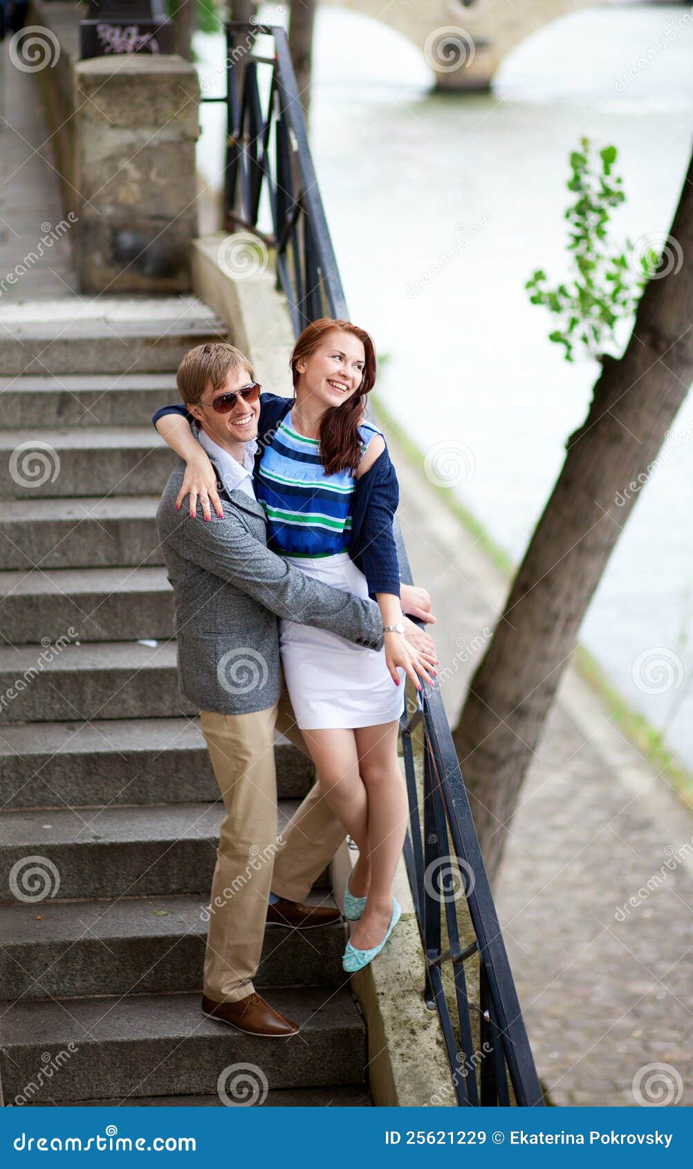Cheerful Couple on the Stairs Stock Image - Image of caucasian, people ...