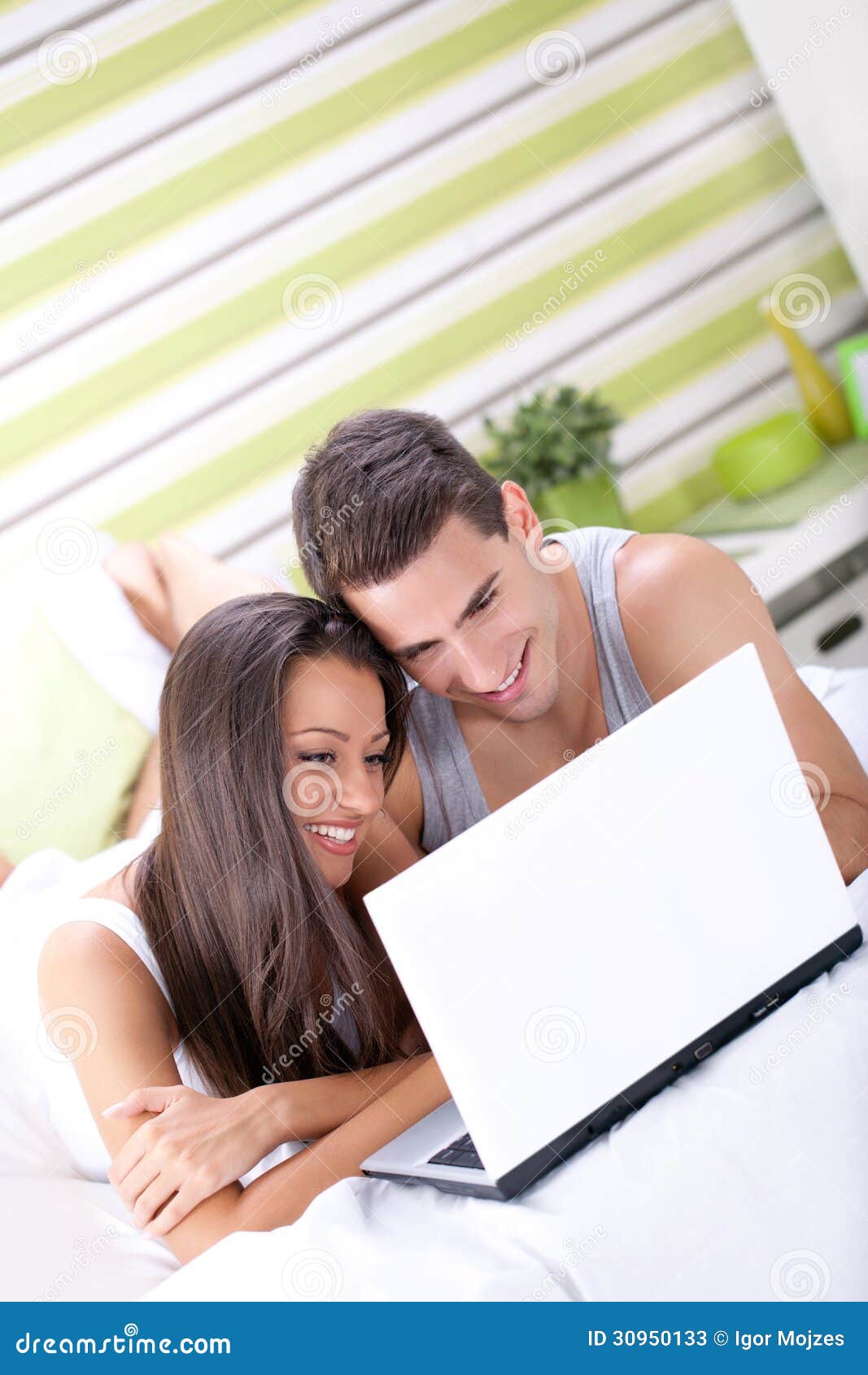 Cheerful Couple Using a Computer Stock Image - Image of internet, girl ...