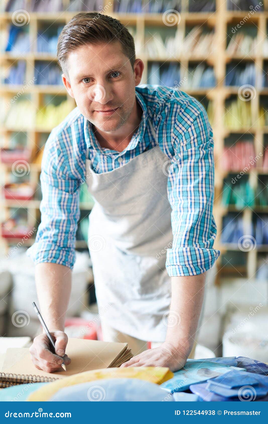 Cheerful Craftsman in Workshop Stock Photo - Image of worker, studio ...