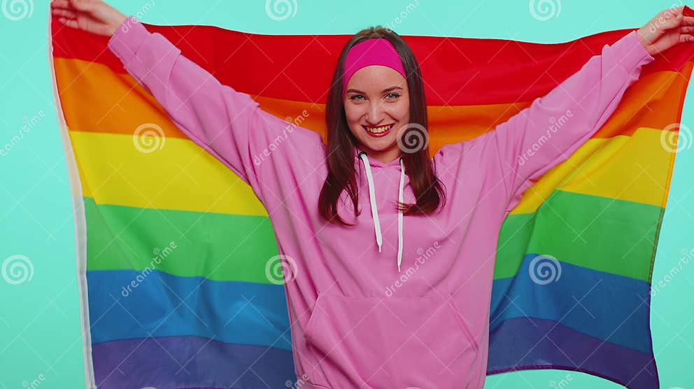 Cheerful Cute Girl Smiling With Rainbow Lgbt Flag Celebrate Parade Show