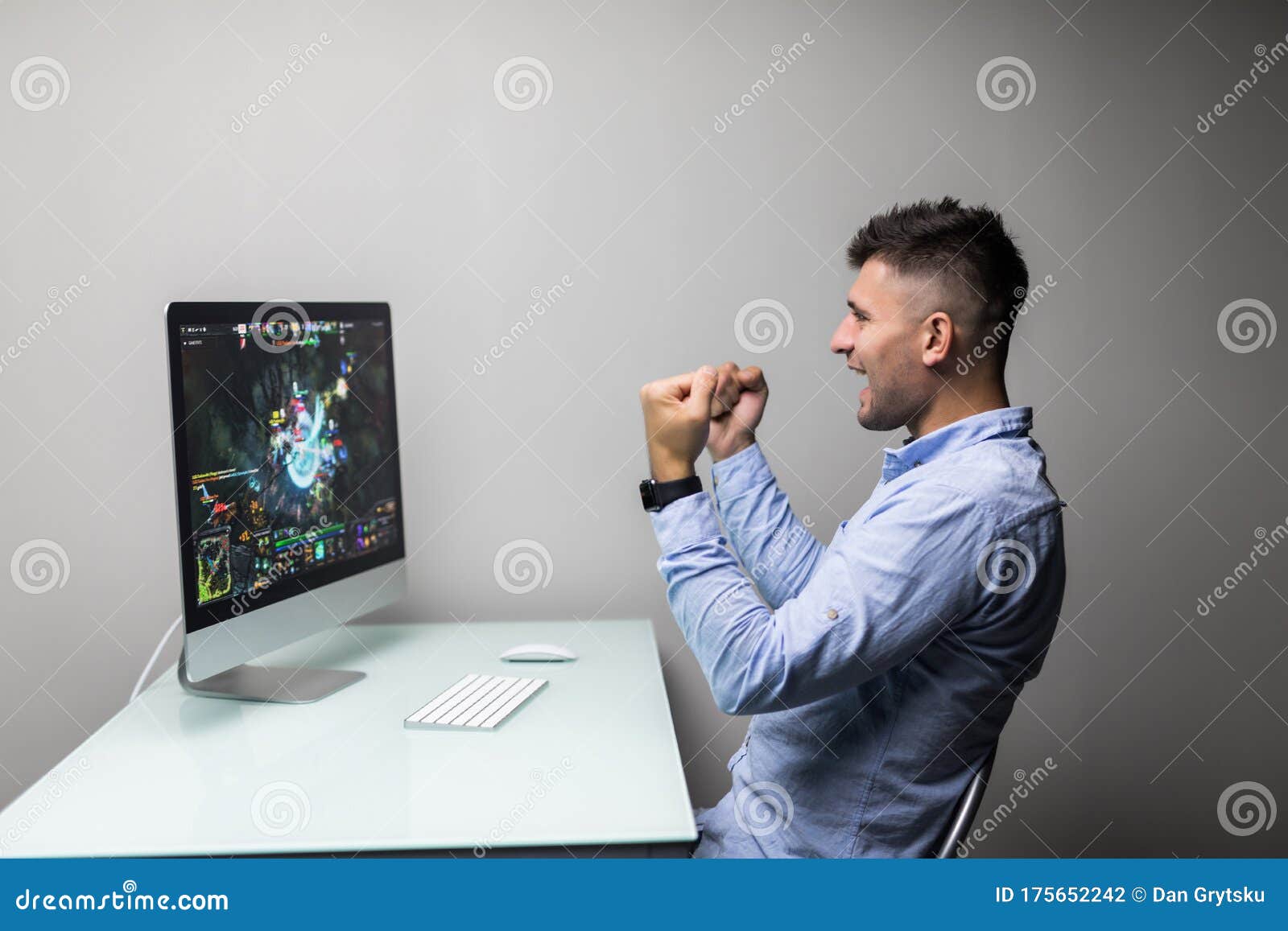 Cheerful Young Man Winning the Computer Game Stock Photo - Image of ...