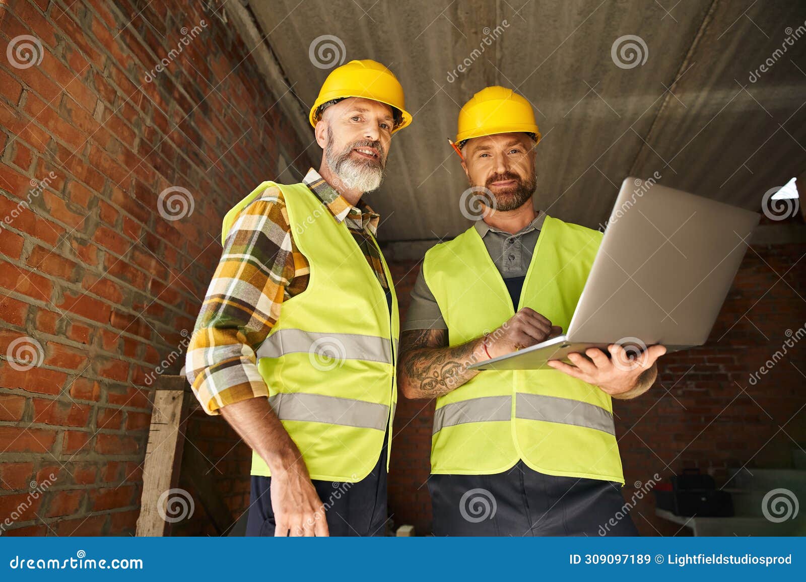 Cheerful Devoted Construction Workers in Safety Stock Image - Image of ...
