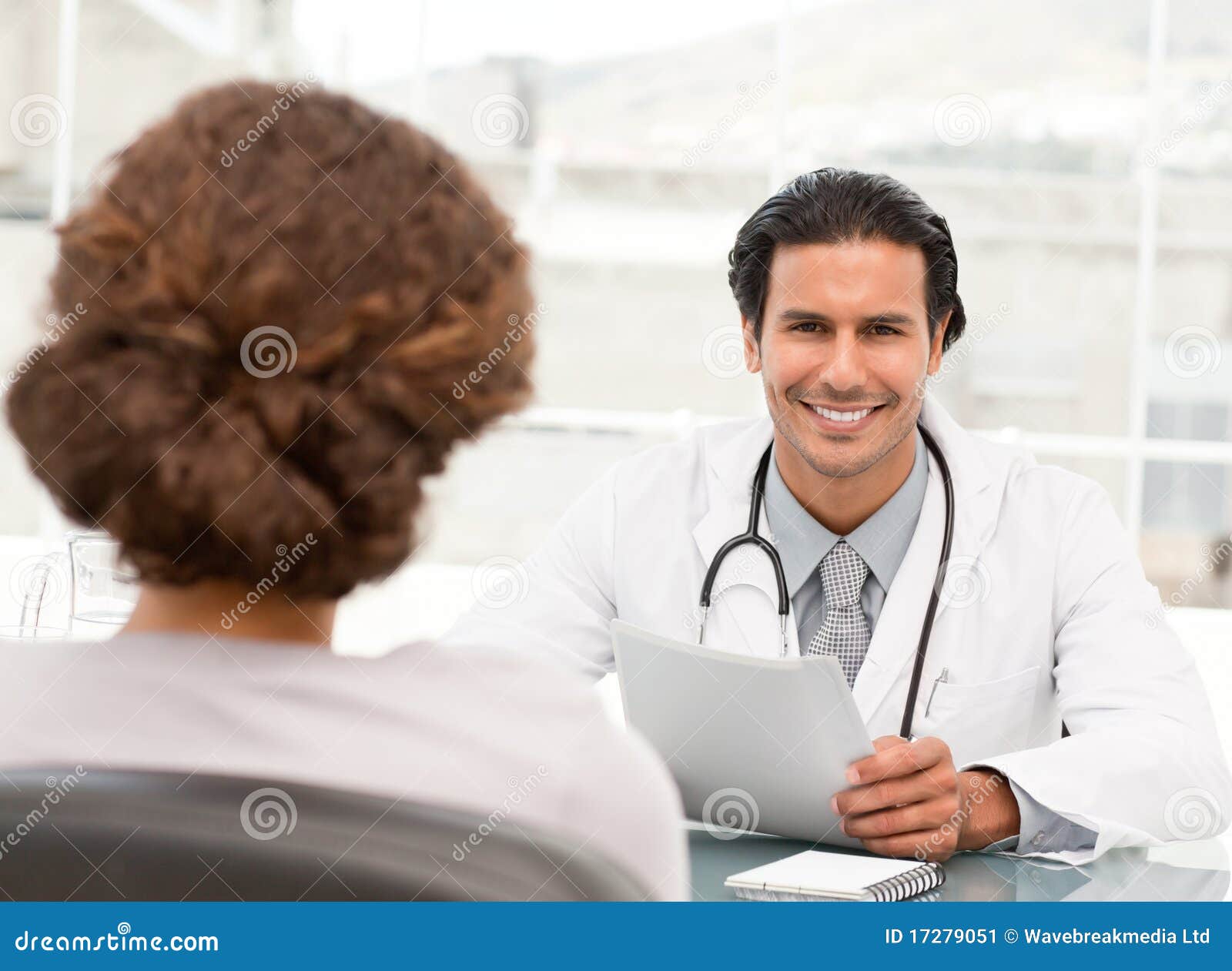 Cheerful Doctor Dring an Appointment Stock Image - Image of cheerful ...