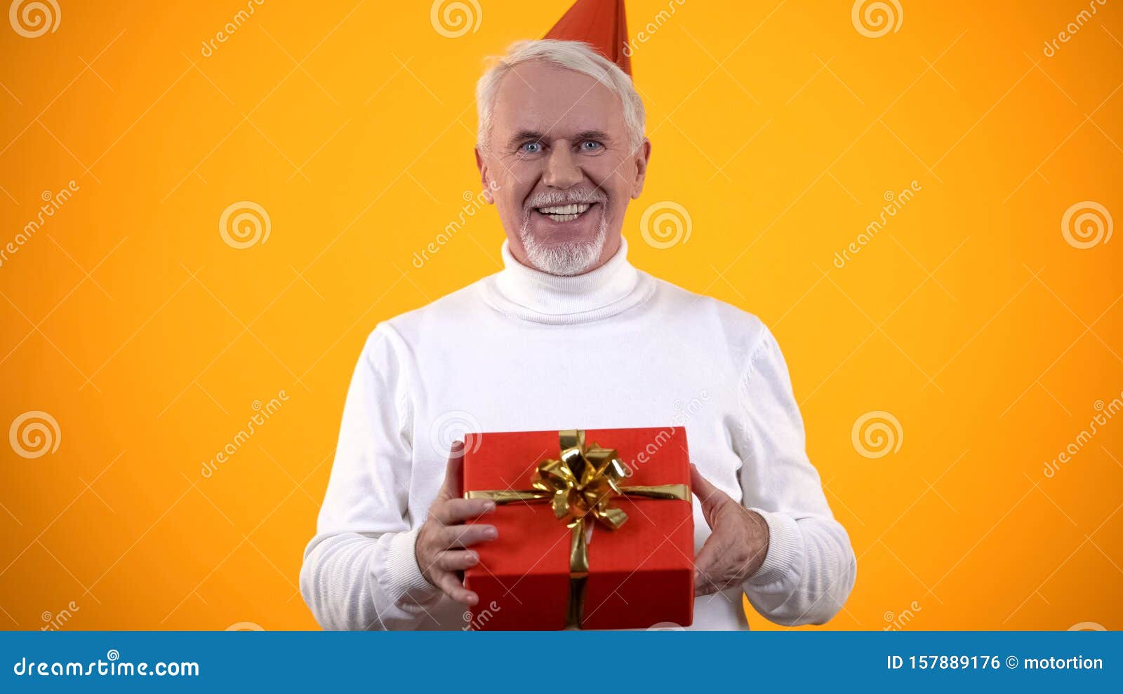 Cheerful Elderly Man Holding Gift Box, Present from Close People ... Cheerful Elderly Man Holding Gift Box, Present from Close People ...